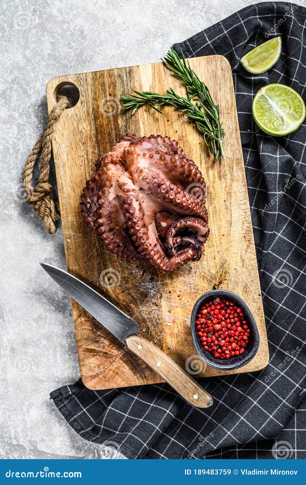 Grilled Whole Octopus on a Cutting Board. Gray Background Stock Image ...