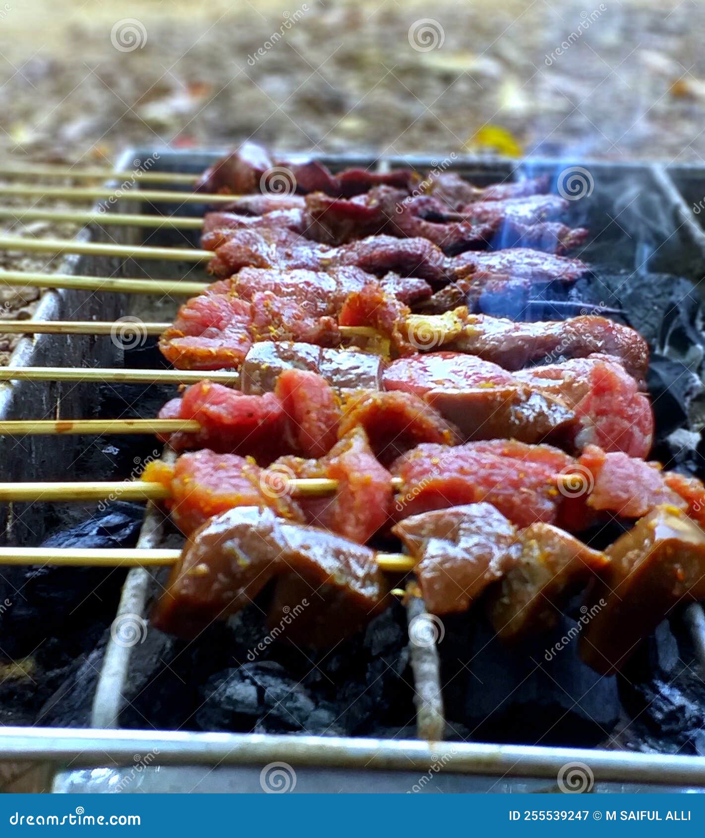 Grilling Beef Satay with a Blend of Indonesian Specialties Stock Image ...