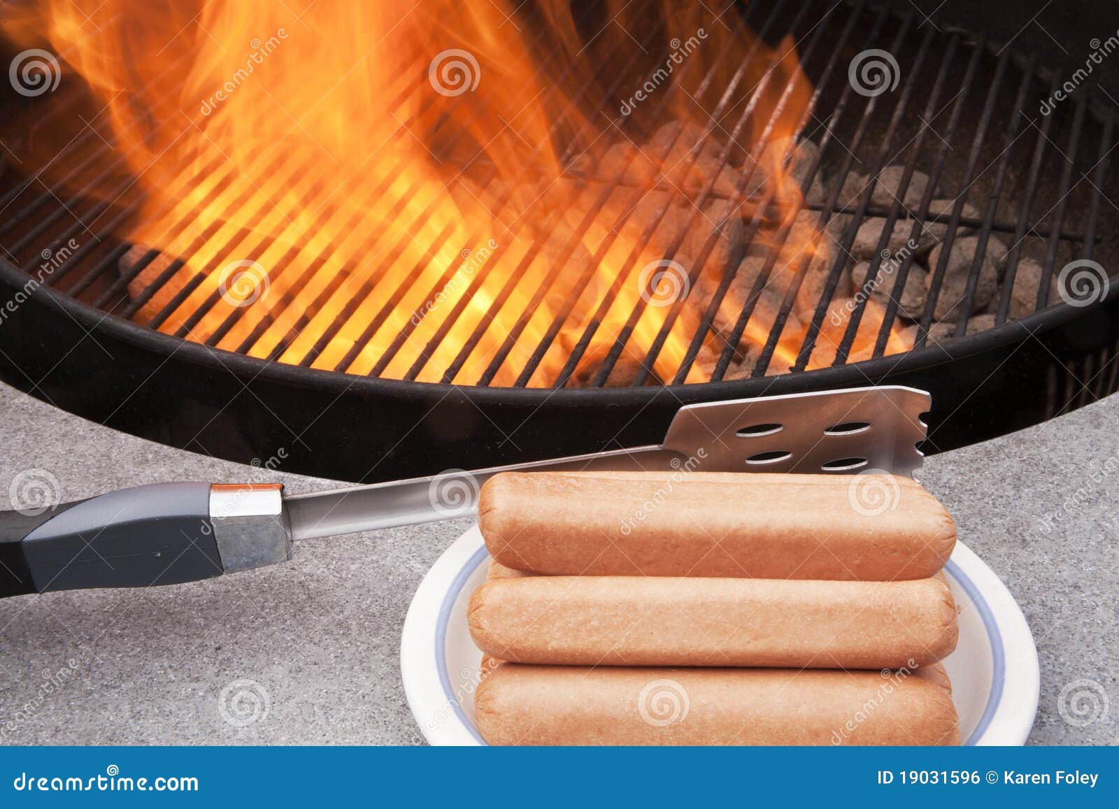 Grilling hot dogs stock photo. Image of fire, flame, dinner - 19031596
