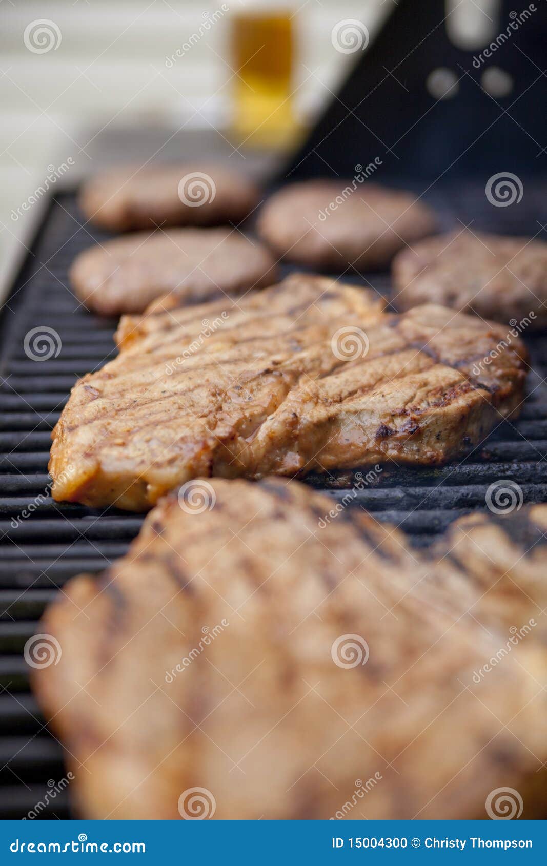 Grilling meat stock photo. Image of hamburgers, slow - 15004300