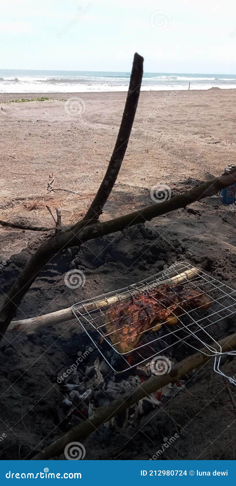 Grilling in the Sand Beach with Eyelevel View Stock Photo - Image of ...
