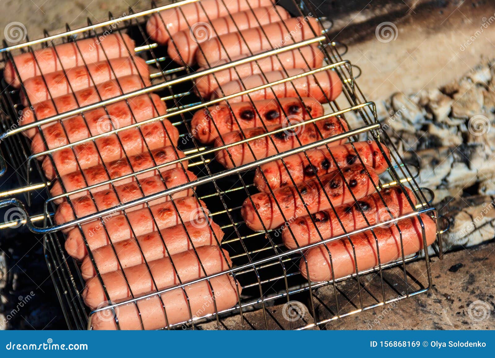 Grilling Sausages in Barbecue Grill Cooking on Campfire Stock Image ...