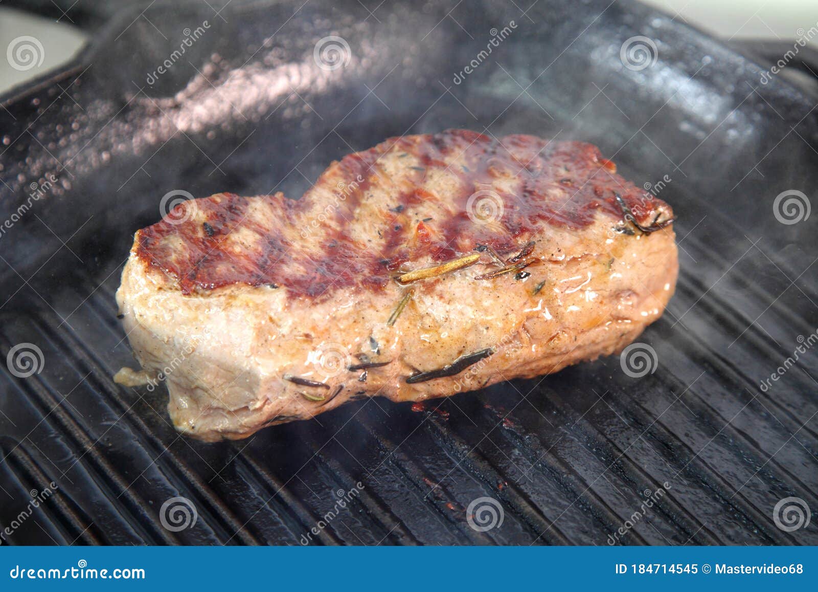 Grilling Steak on a Grill Pan. Beef Tender Steak on the Grill Pan. Meat ...