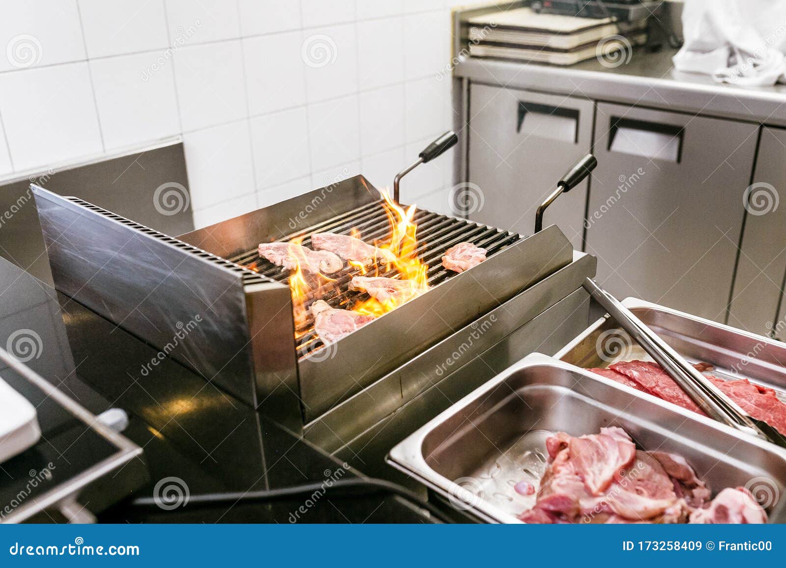 Grilling steaks with fire stock image. Image of chef - 173258409