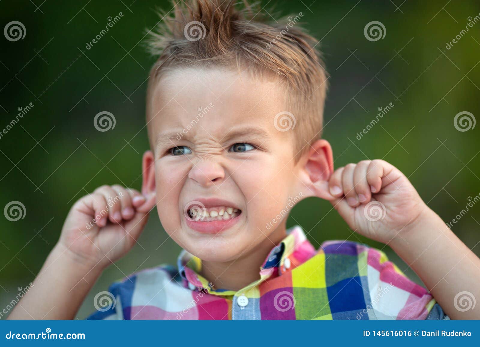 A grimacing kid stock photo. Image of portrait, play - 145616016