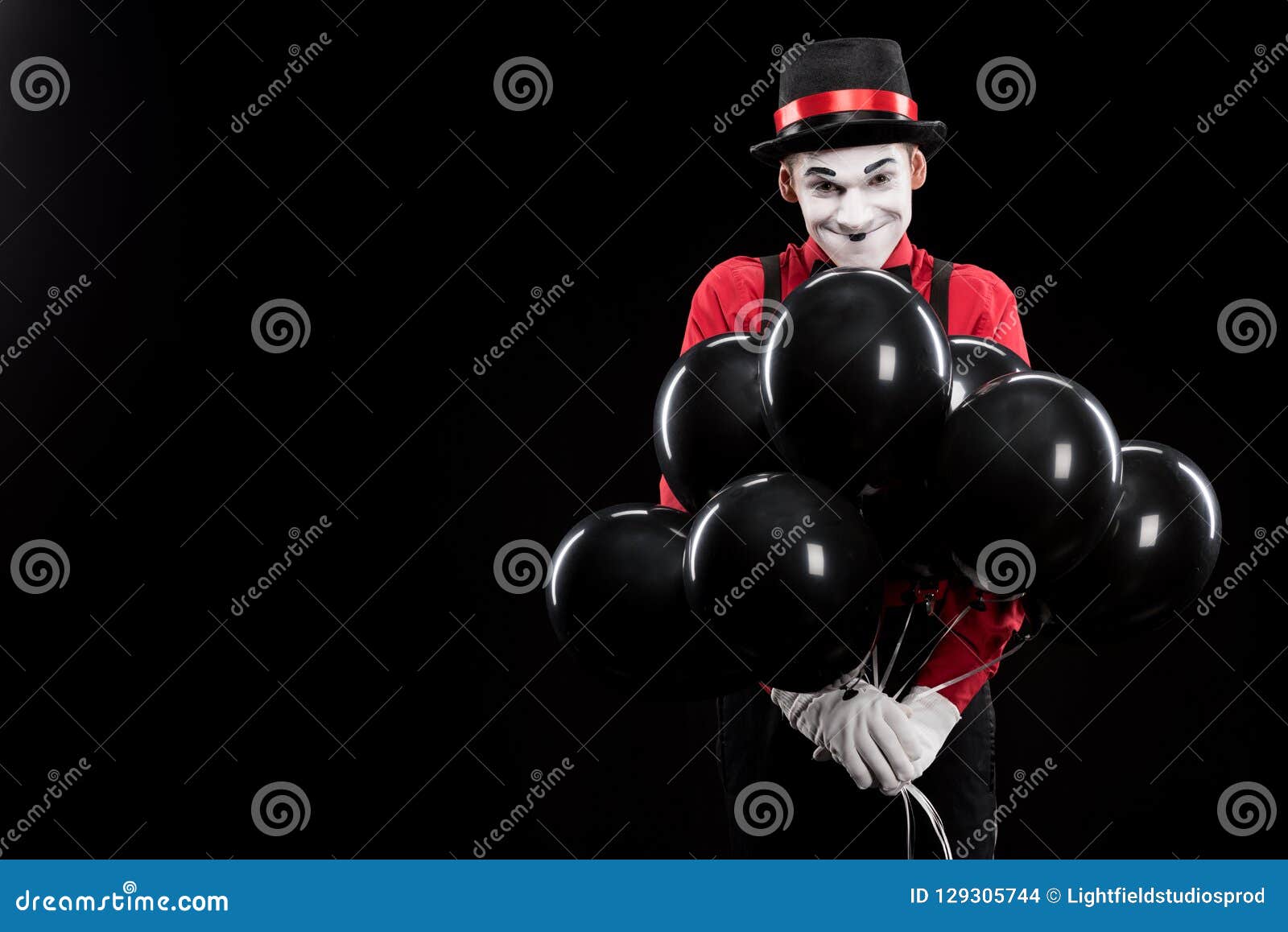 Grimacing Mime with Bundle of Helium Balloons Stock Photo - Image of ...