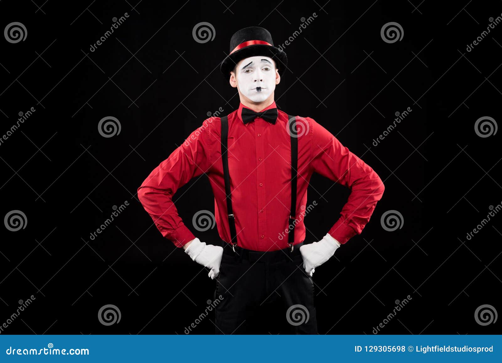 Grimacing Mime Standing with Hands Akimbo Stock Photo - Image of mime ...