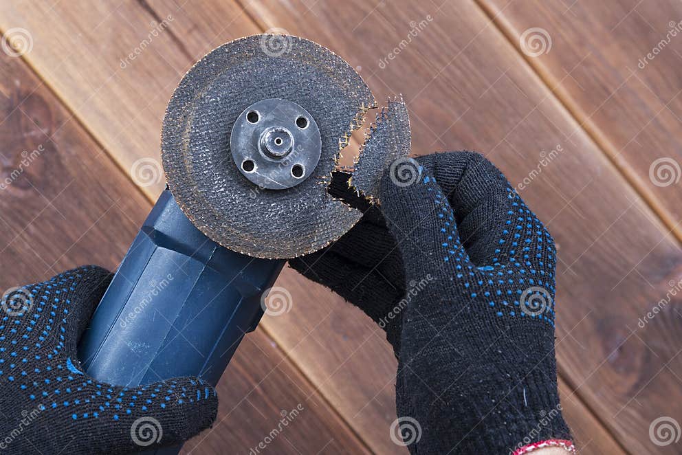 A Grinder with a Broken Blade on a Wooden Table. the Danger of Using ...