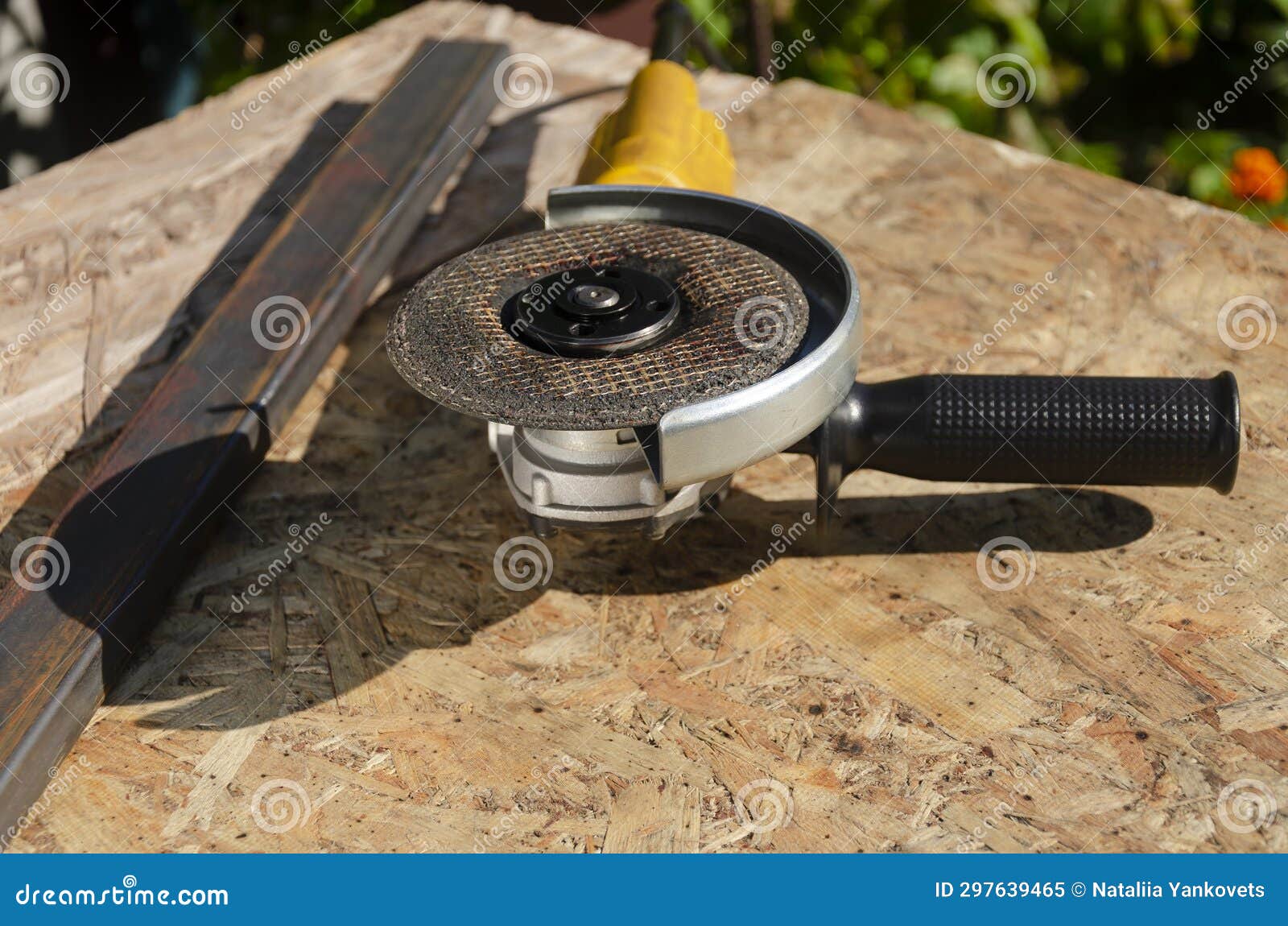 A Grinder with a Metal Disc is Lying on the Table Stock Image - Image ...