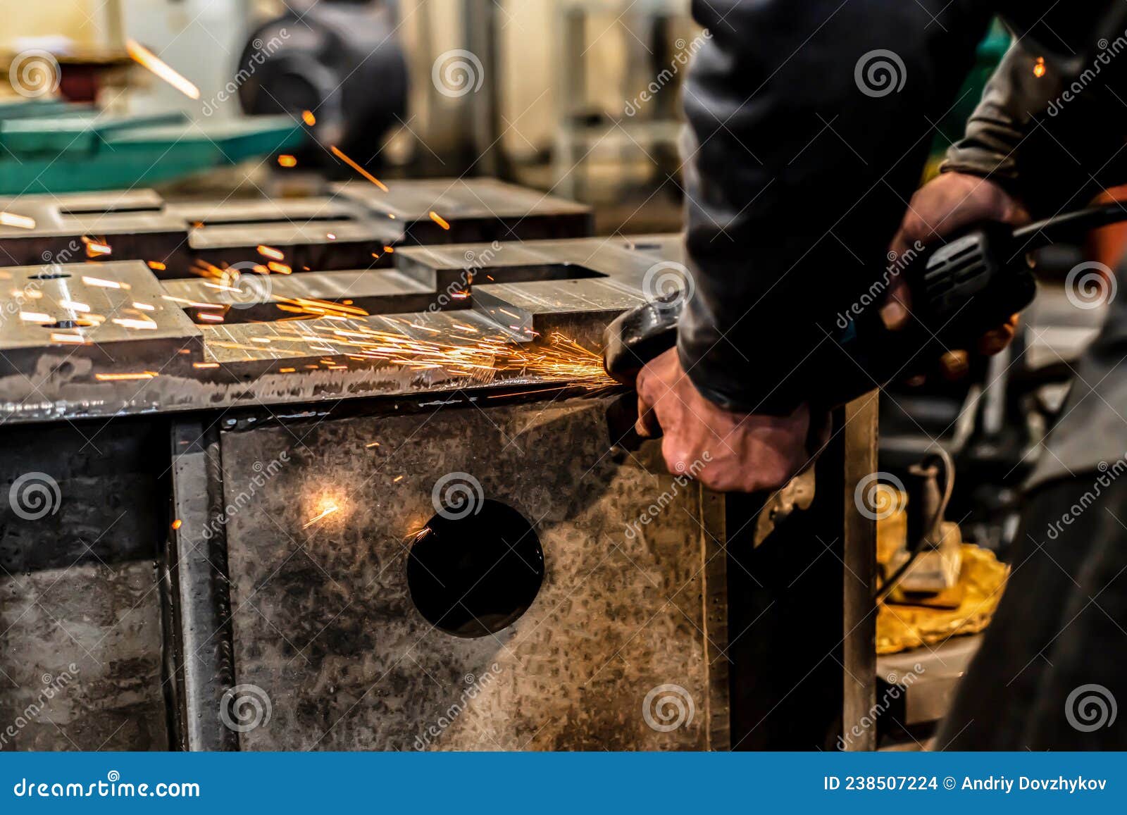 Grinding Burrs and Metal with an Angle Grinder with Sparks Stock Photo ...
