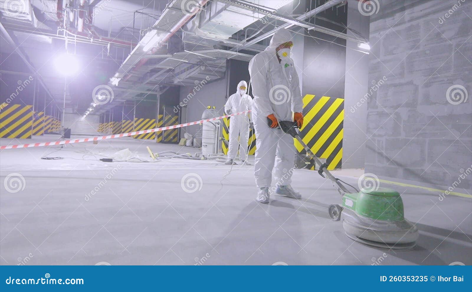 Grinding a Concrete Floor with a Grinder. Builder Works Concrete Floor ...