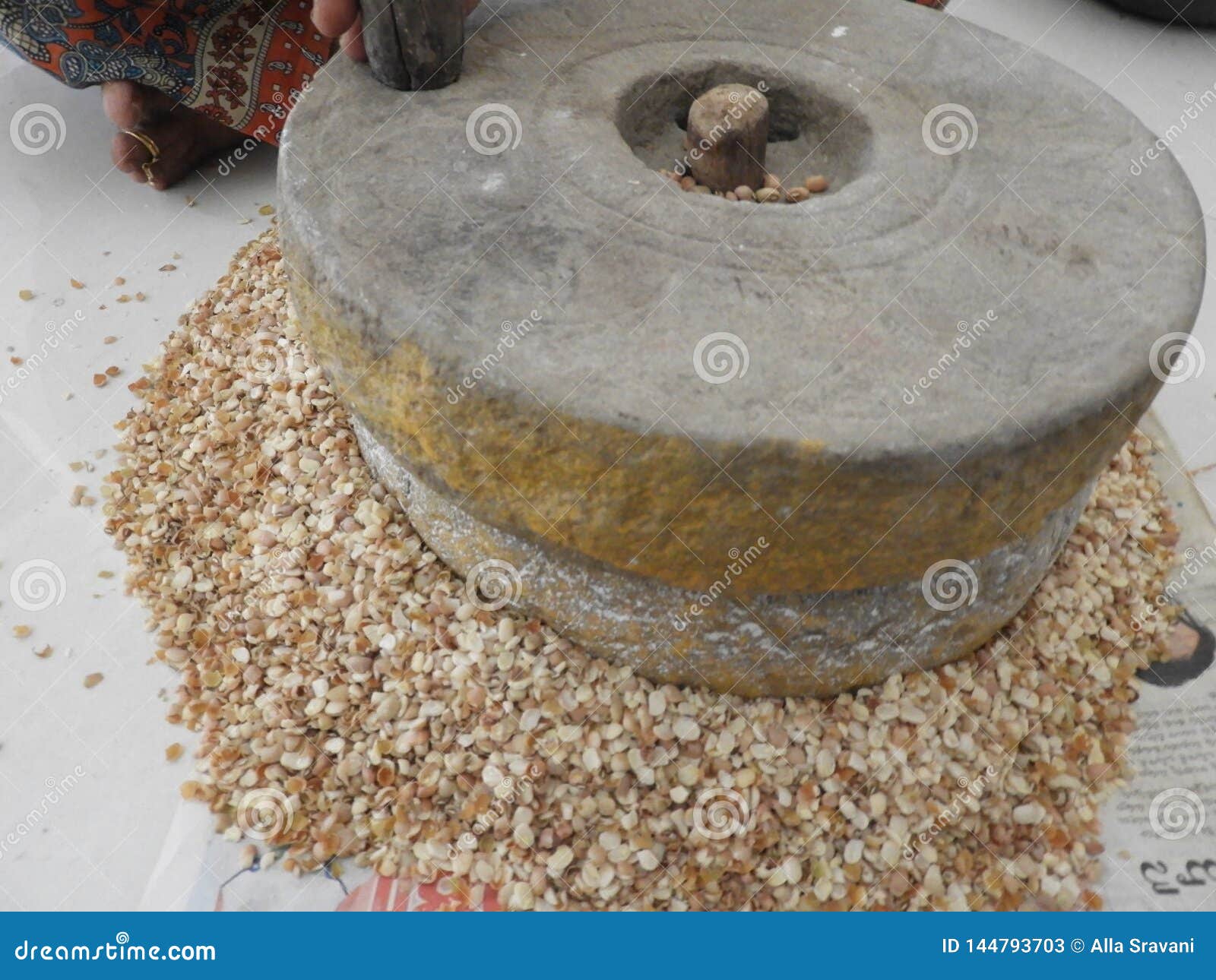 Hand Grinding Cow Peas with Millstone in Indian House Stock Image ...