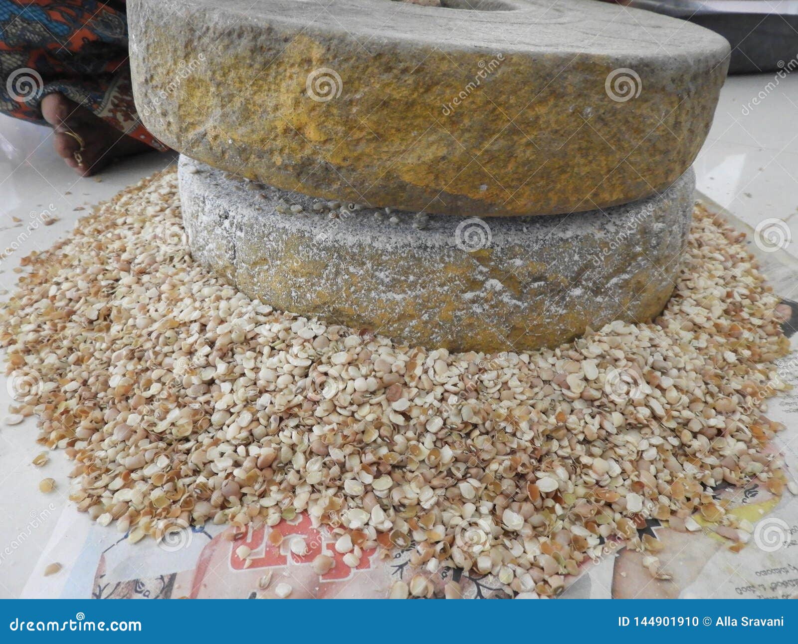 Hand Grinding Cow Peas with Millstone in Indian House Stock Photo ...
