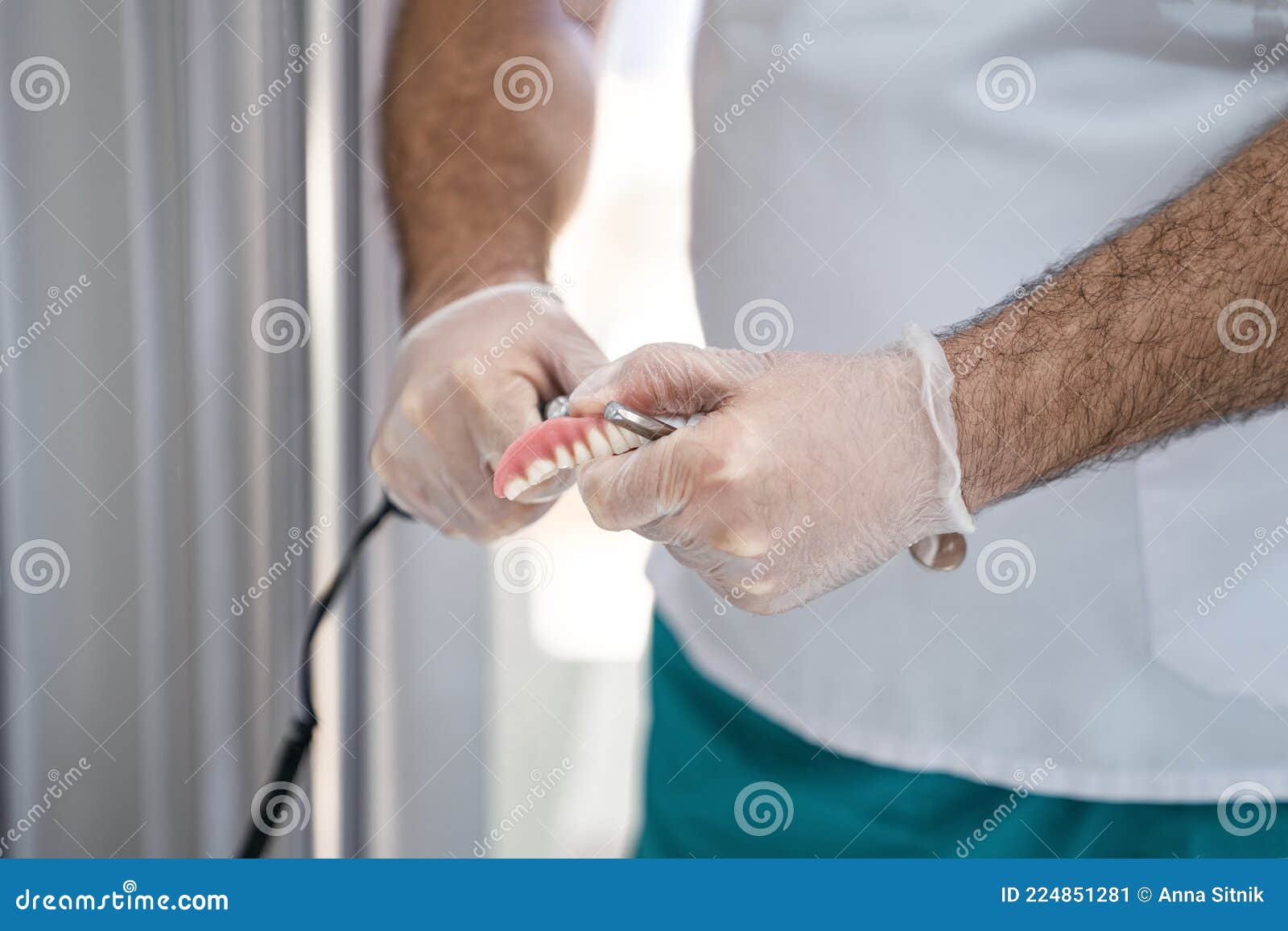 Grinding of the denture stock image. Image of professional - 224851281