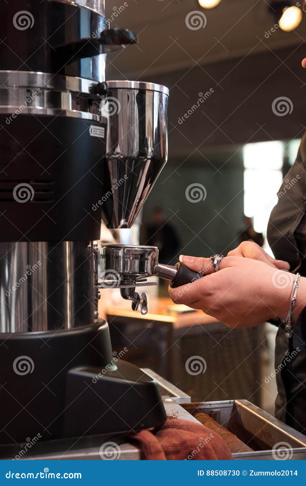 Grinding and Dosing of Coffee for the Espresso Machine. Stock Photo ...