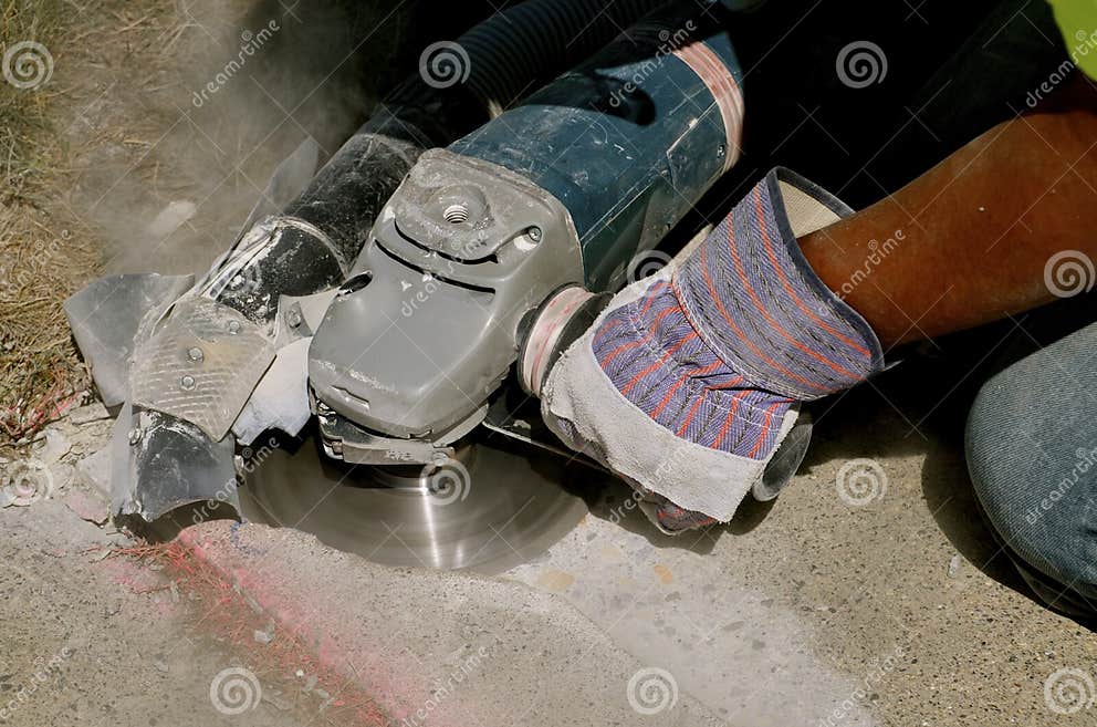 Grinding the Edge of a Heaved Sidewalk Stock Photo - Image of material ...
