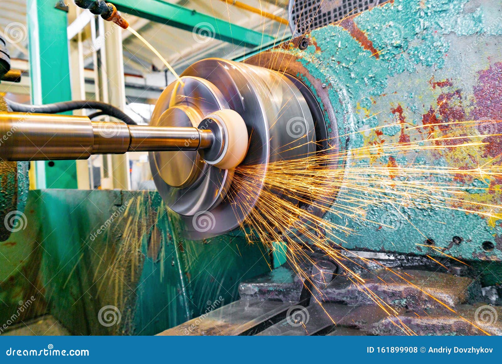 Grinding the End of the Abrasive Wheel with Sparks on a Circular ...