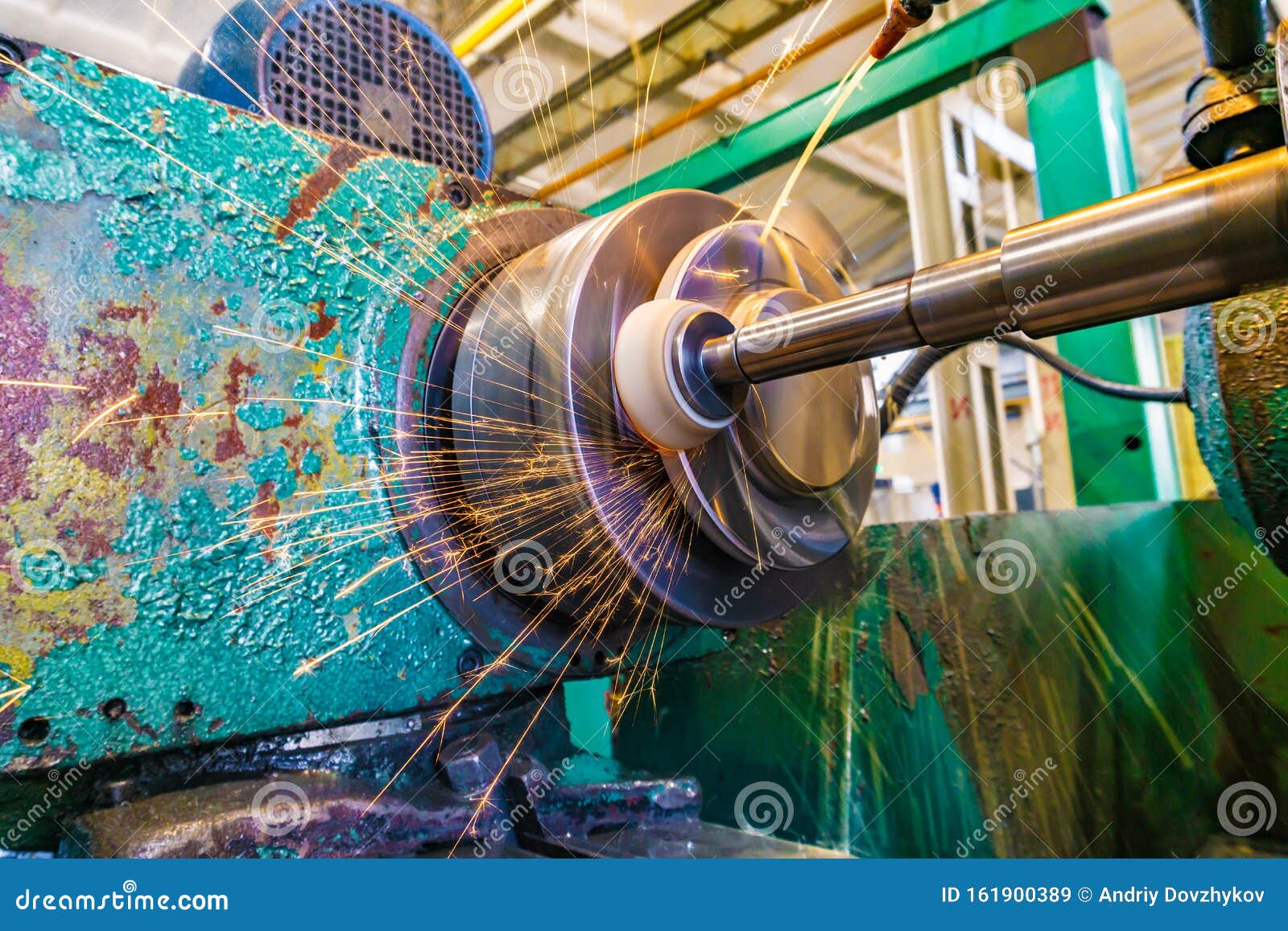 Grinding the End of the Abrasive Wheel with Sparks on a Circular ...