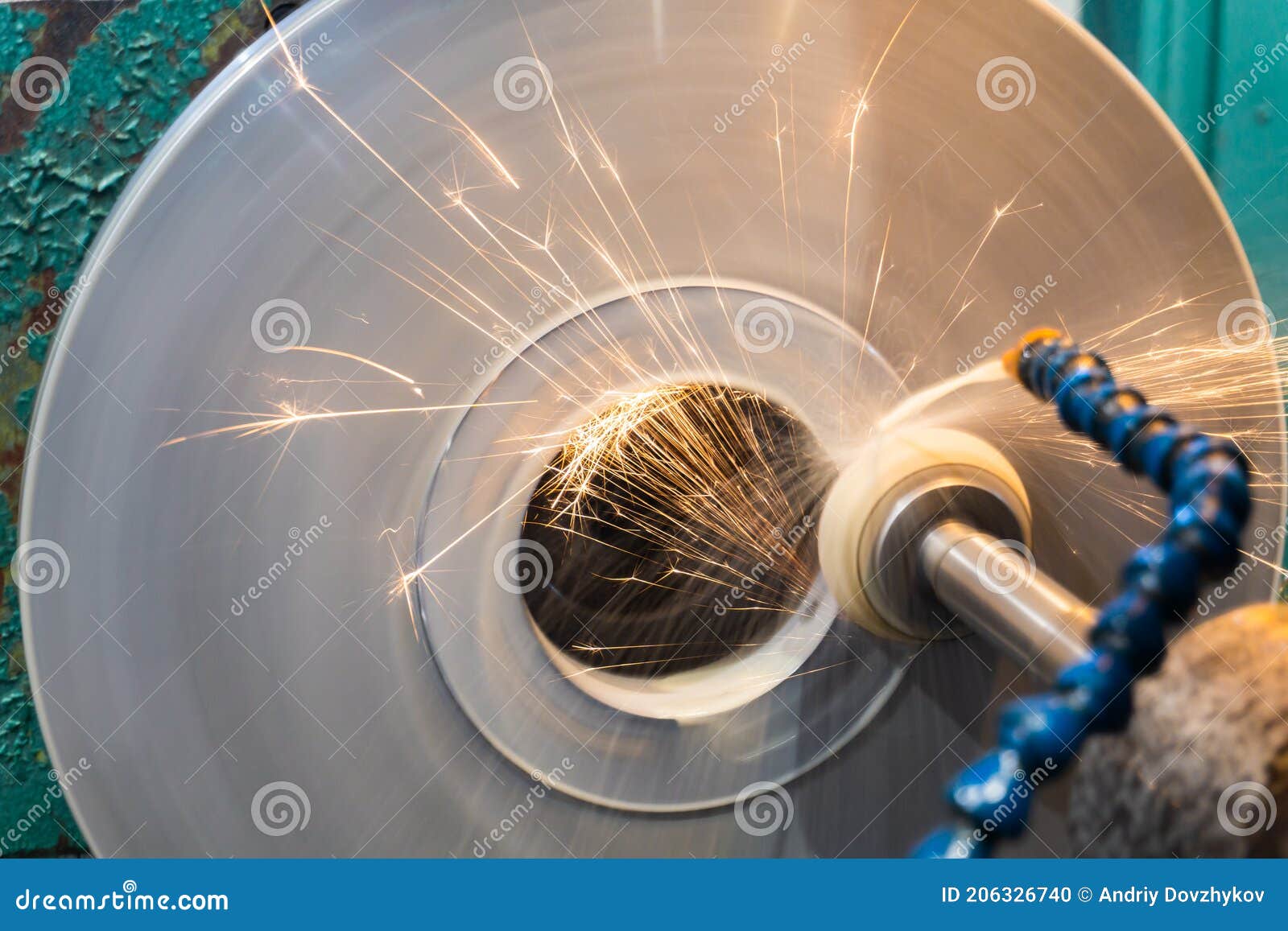 Grinding the End of the Workpiece with an Abrasive Wheel on a Circular ...