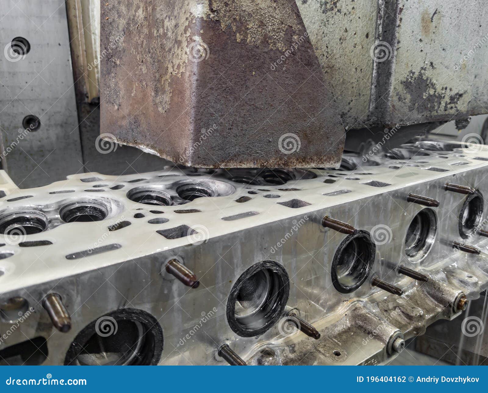 Grinding the Head of a Six-cylinder Engine on a Surface Grinder Stock ...