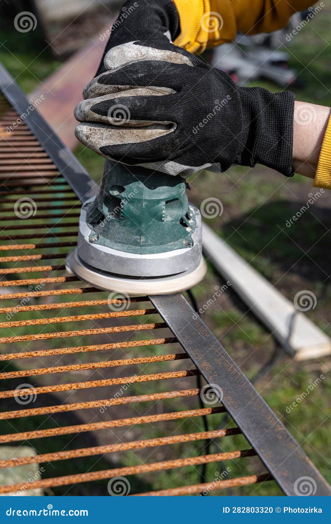 Grinding of a Metal Grid Using a Vibrating Sander Stock Photo - Image ...