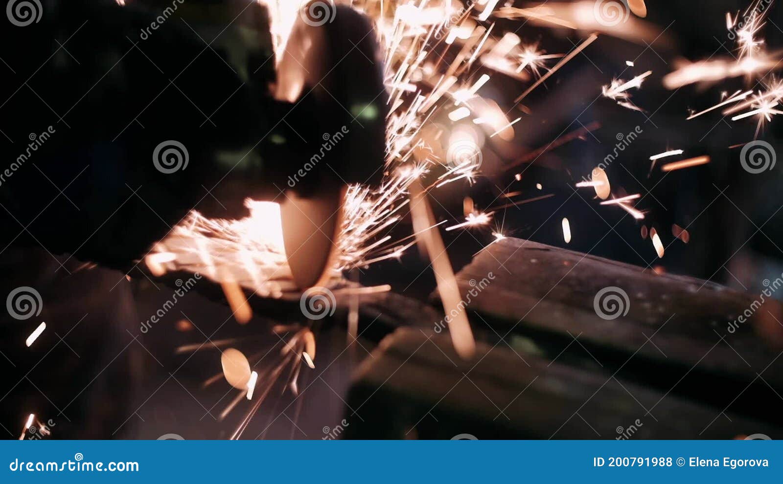 Grinding Metal with a Grinder. the Blacksmith Works with Metal Stock ...