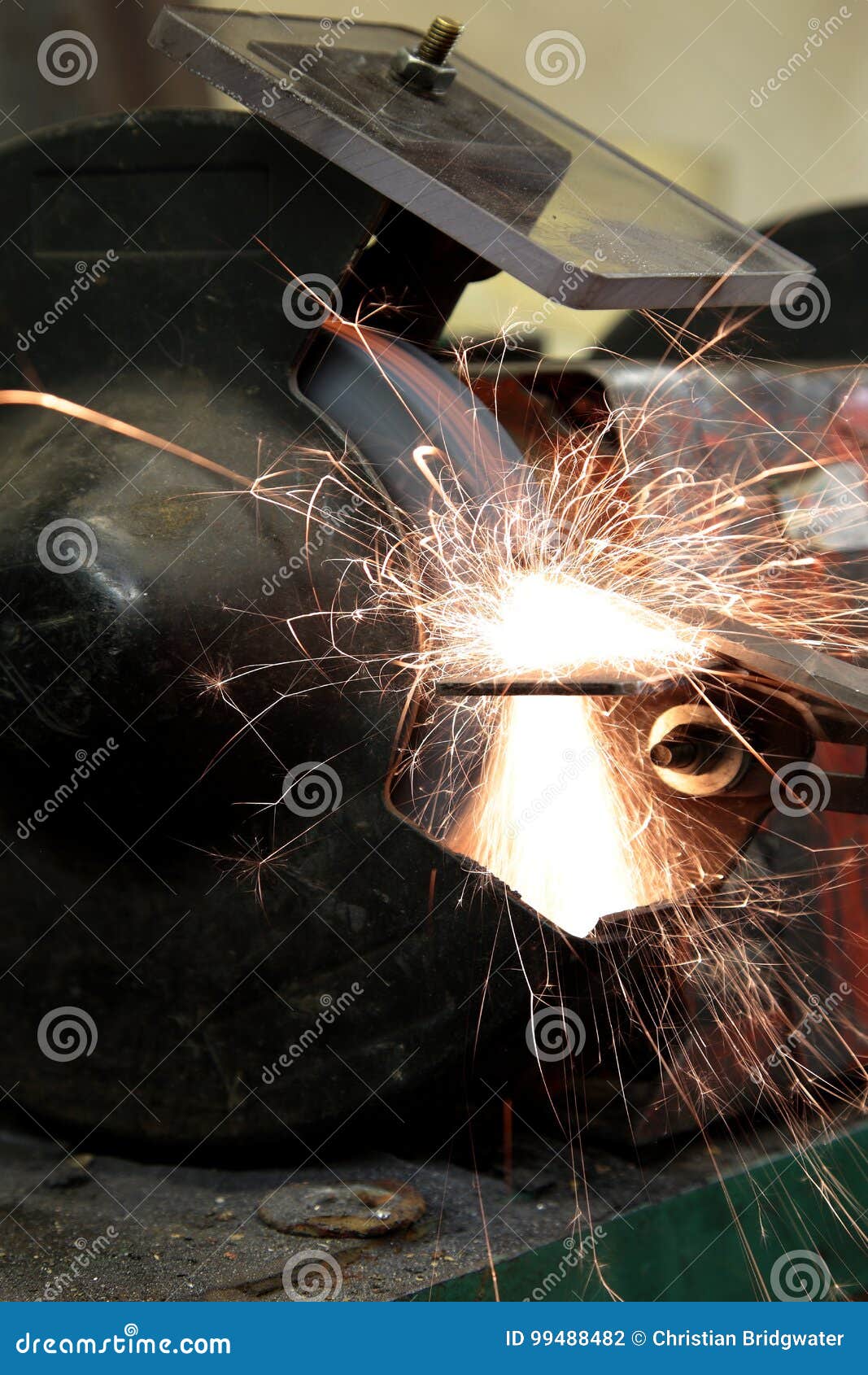Grinding Metal with a Grinder in a Workshop Stock Photo - Image of ...