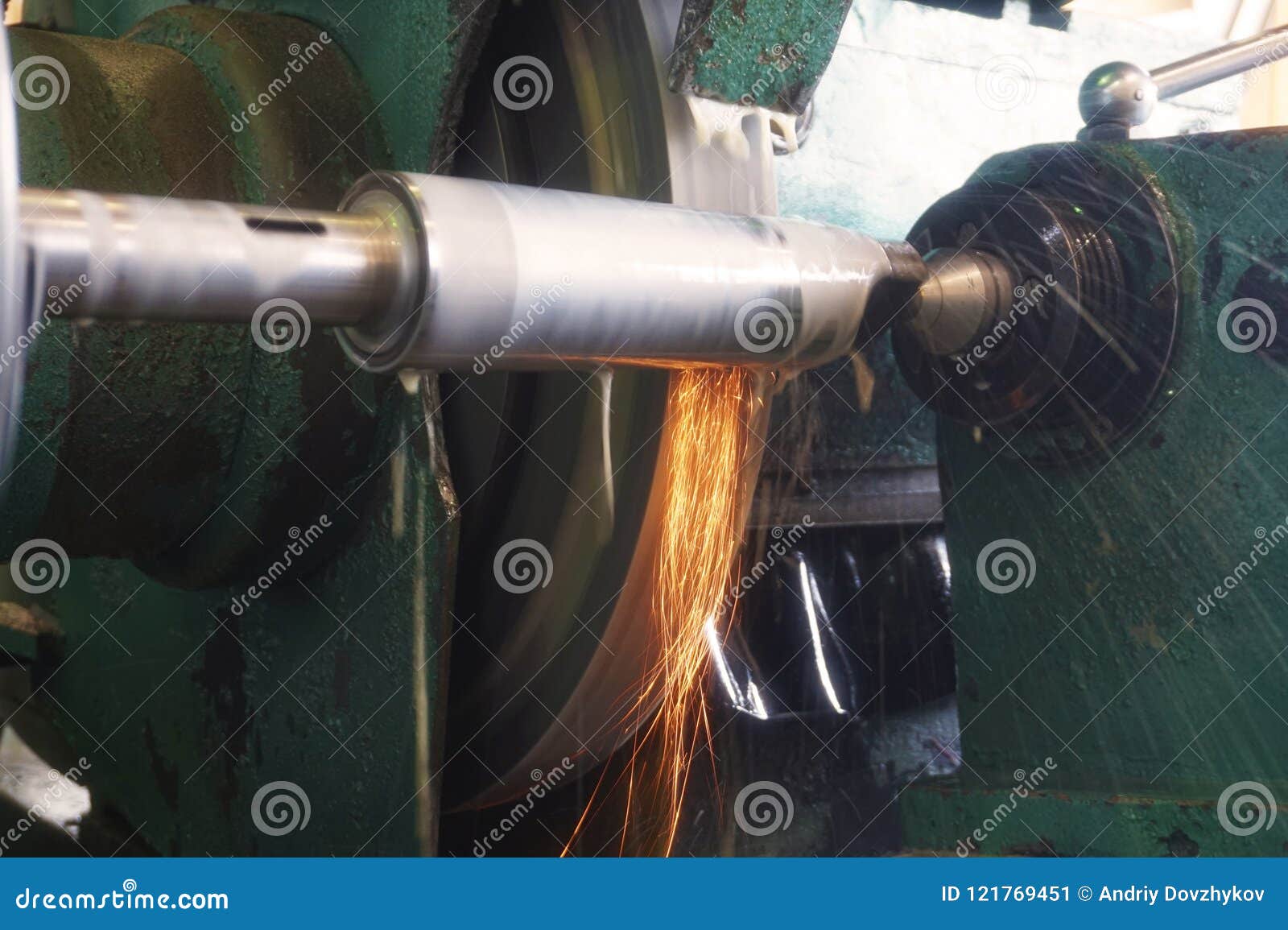 Grinding the Shaft on the Machine with Sparks and Cooling, at Different ...