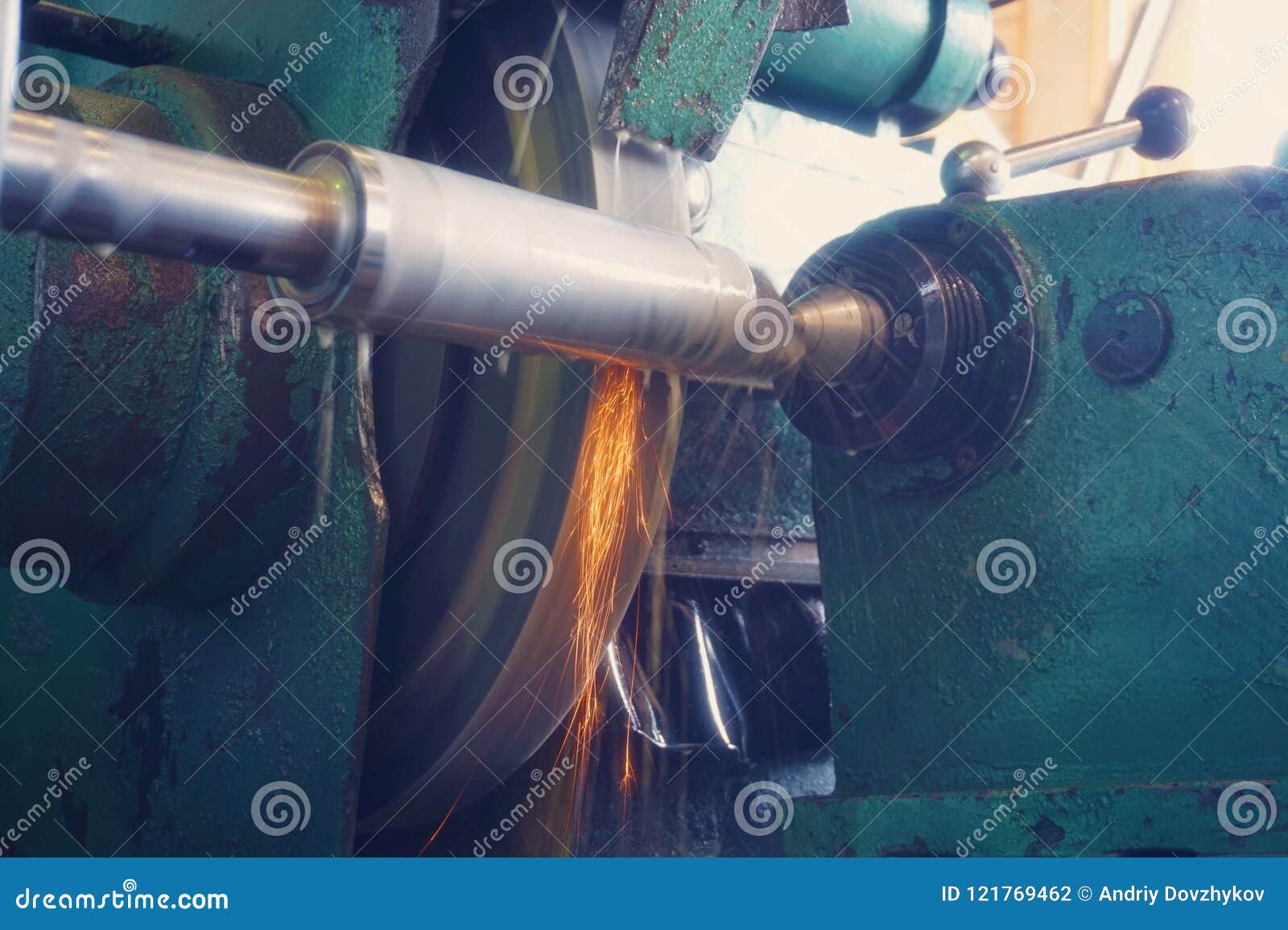 Grinding the Shaft on the Machine with Sparks and Cooling, at Different ...