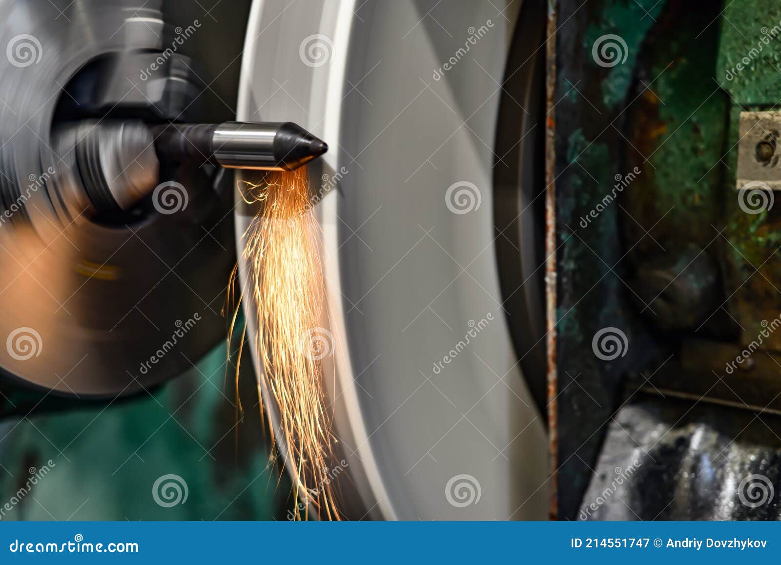 Grinding a Shaft with Sparks with an Abrasive Wheel on a Grinding ...