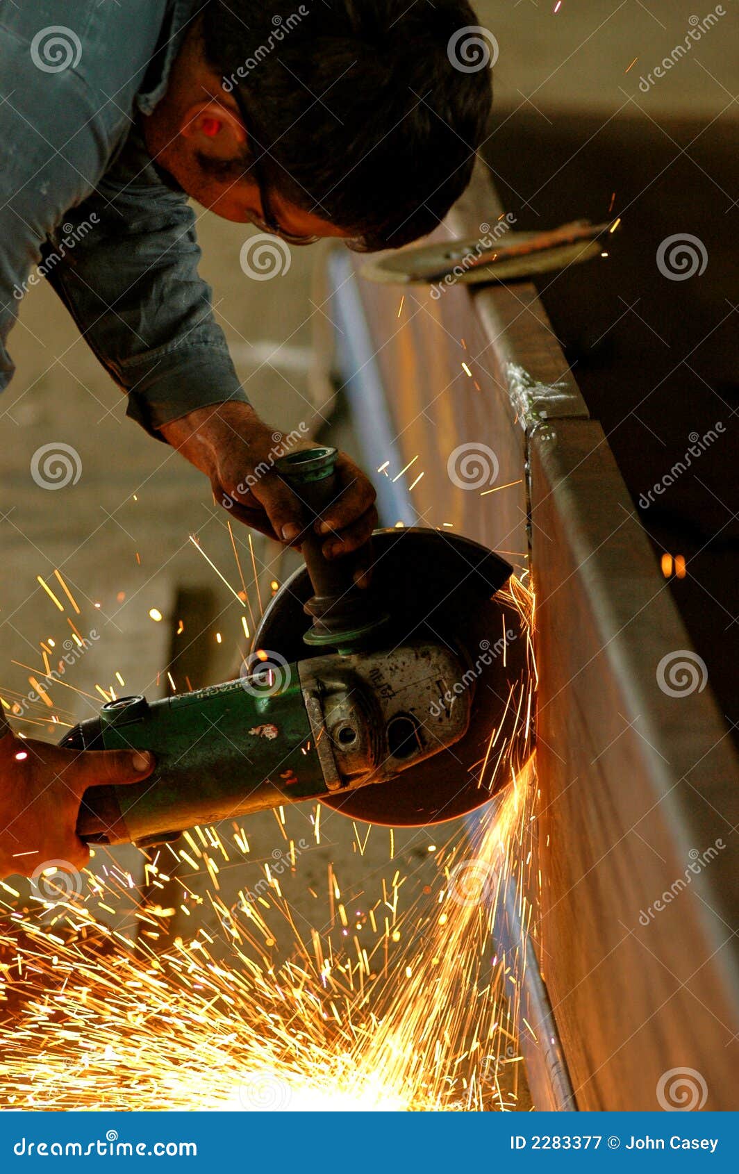 Grinding steel stock image. Image of spark, manual, heat - 2283377