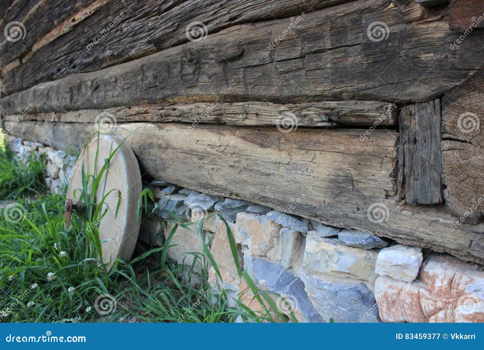 Grinding Stone Resting on Cabin Side. Stock Image - Image of foundation ...