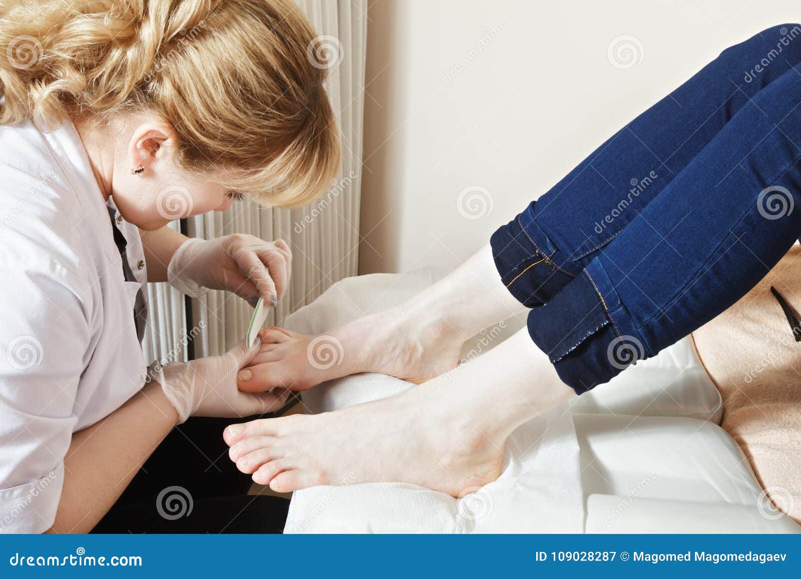 Grinding toenails process stock image. Image of feet - 109028287