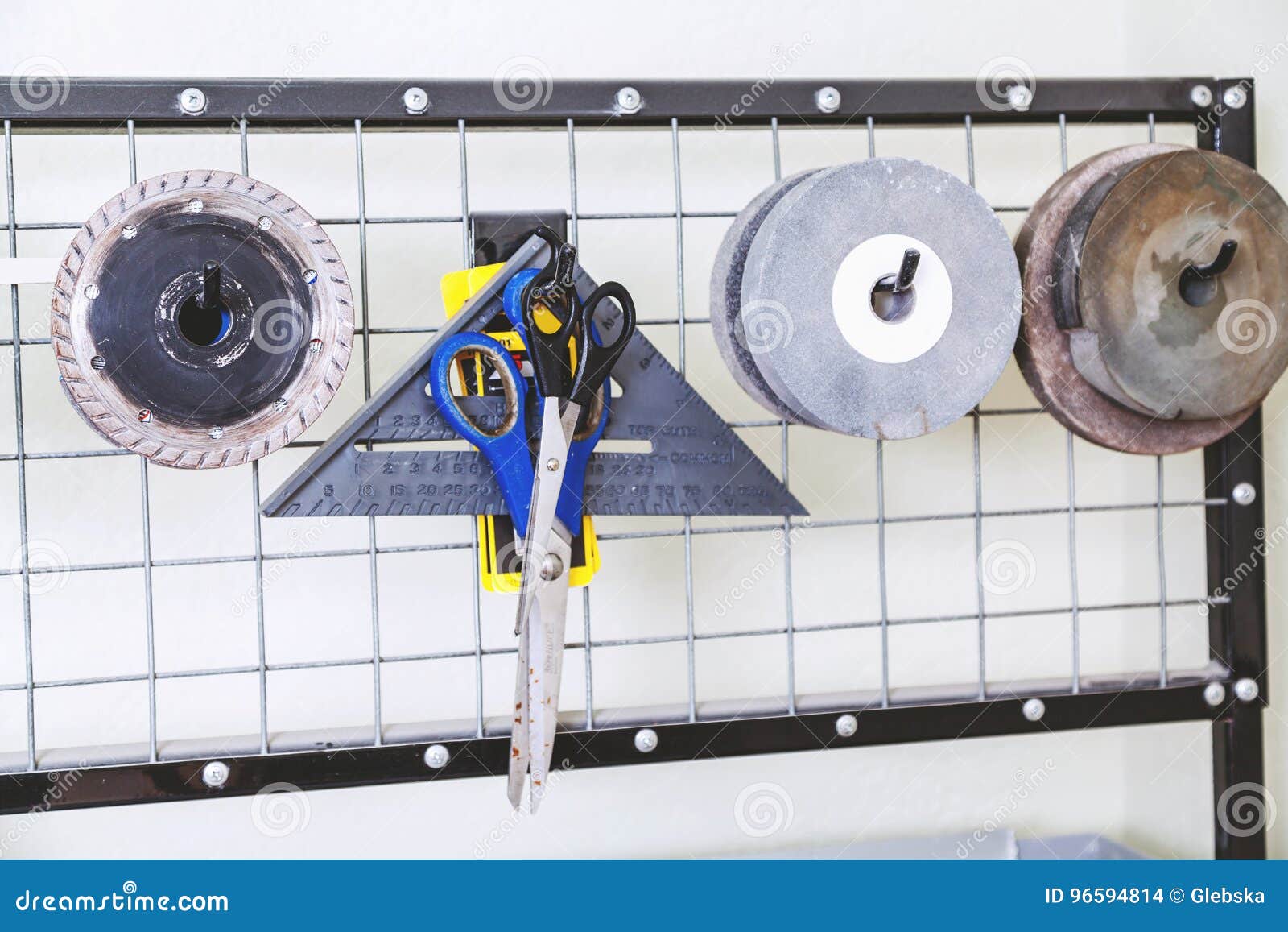 Grinding Wheels Gently Stir in Vertical Grid in Studio Stock Photo ...