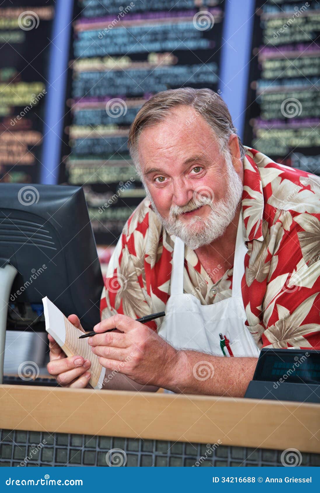 Grinning Cafe Worker Taking Orders Stock Photo - Image of owner ...