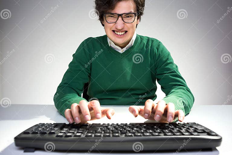 Grinning Man Using Keyboard Stock Photo - Image of hands, european ...