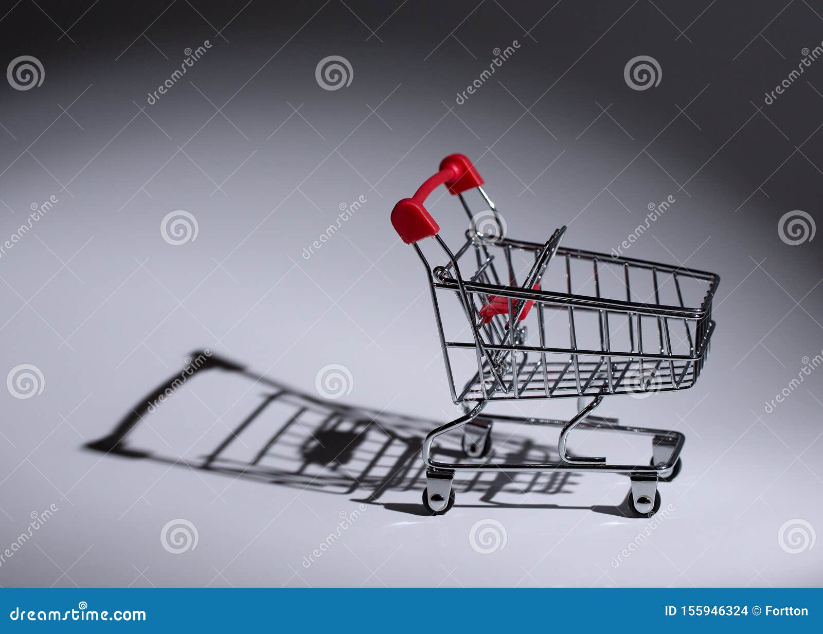 Grocery Cart Casting a Shadow Stock Photo - Image of business ...