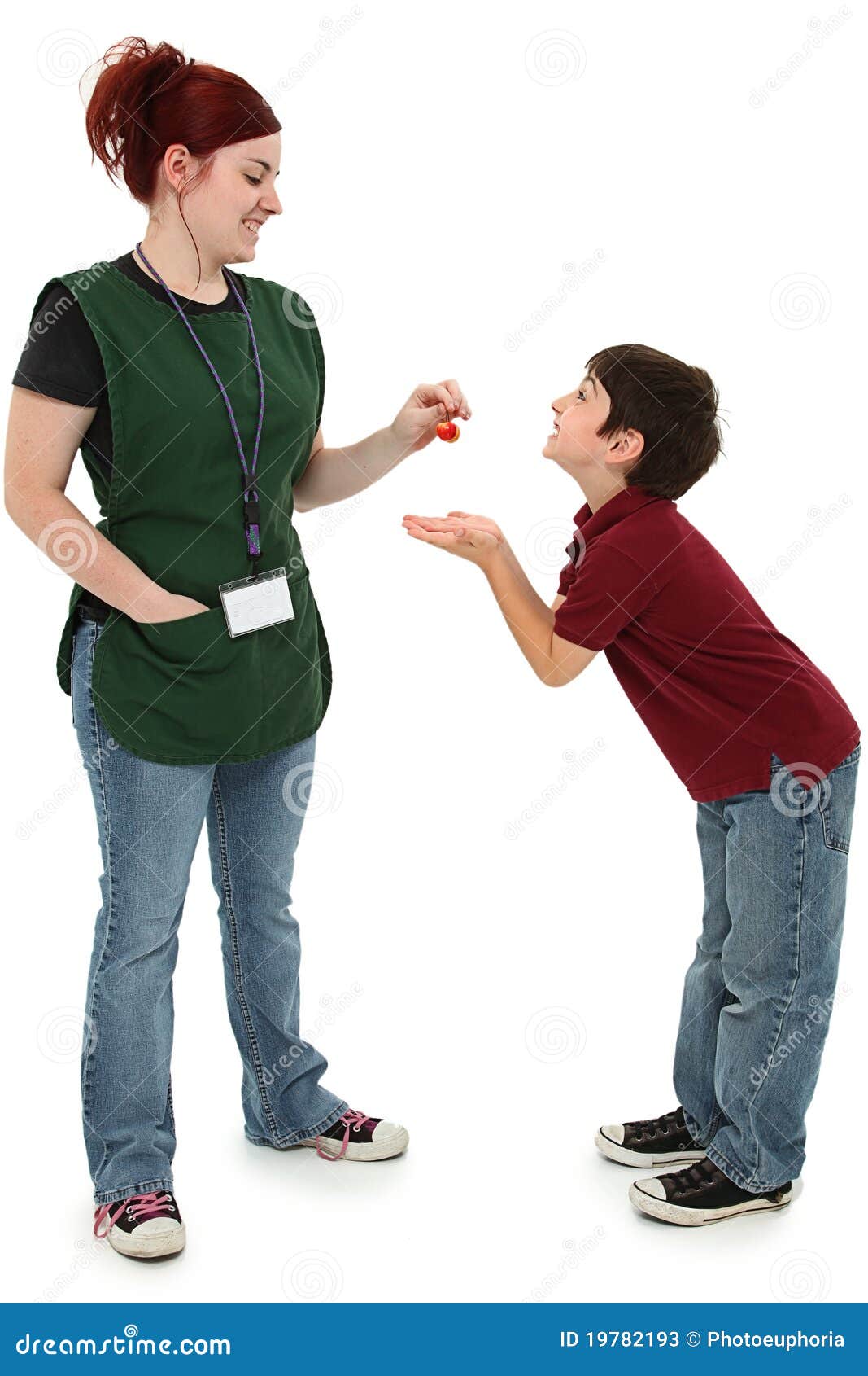 Grocery Clerk Giving Child Cherries In Store Stock Image ...