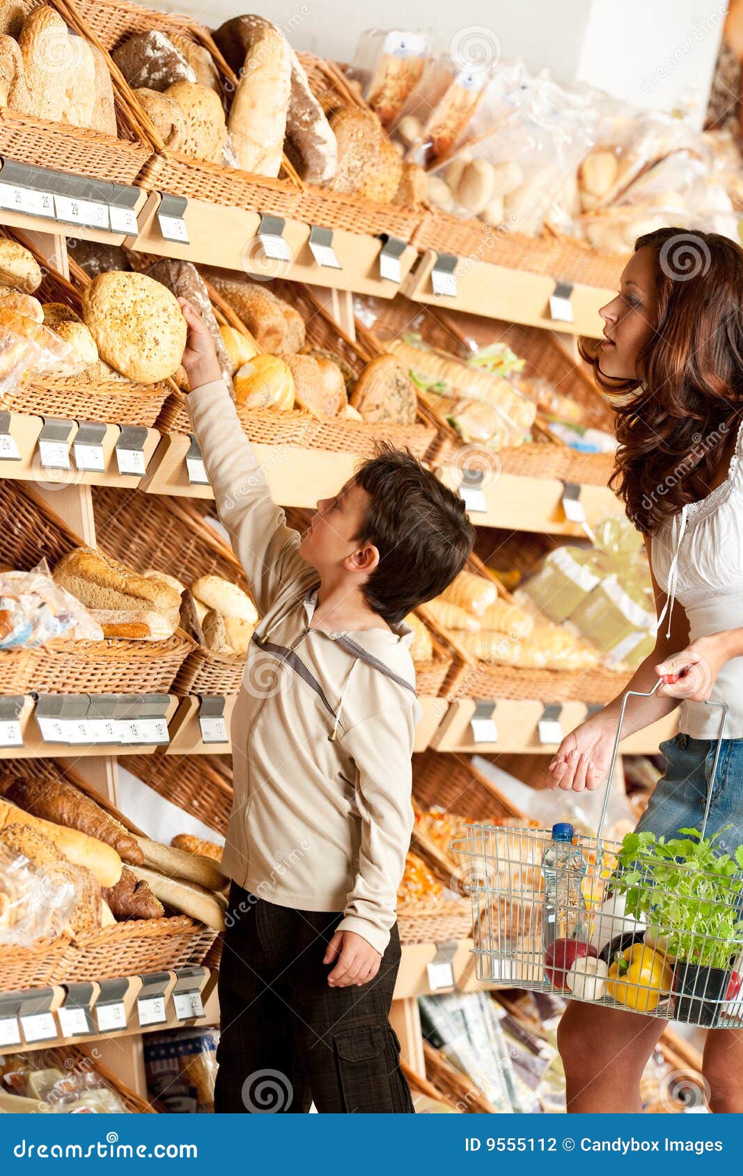 Grocery Store - Woman and Child Choosing Bread Stock Photo - Image of ...