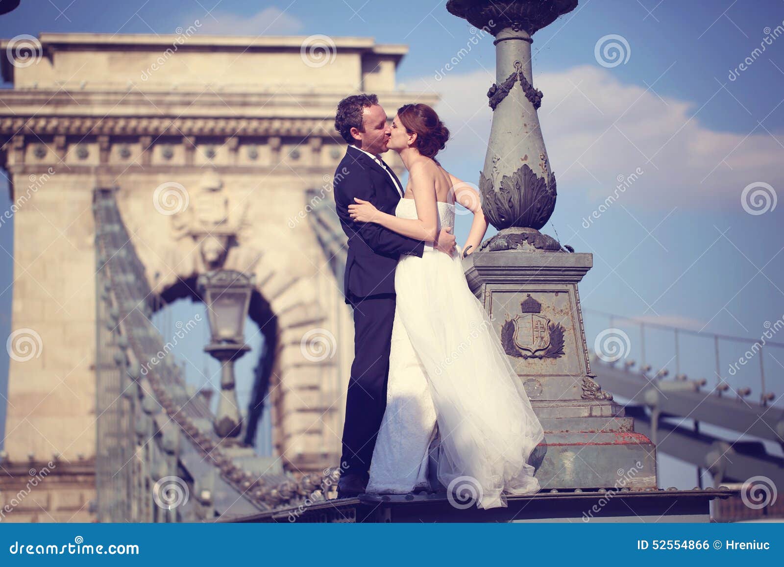 Groom and Bride on a Bridge Stock Photo - Image of romantic, bride ...