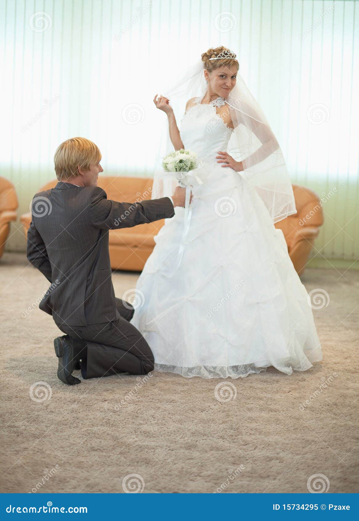 Groom with Bride Funny Pose in Hall Stock Image - Image of give ...