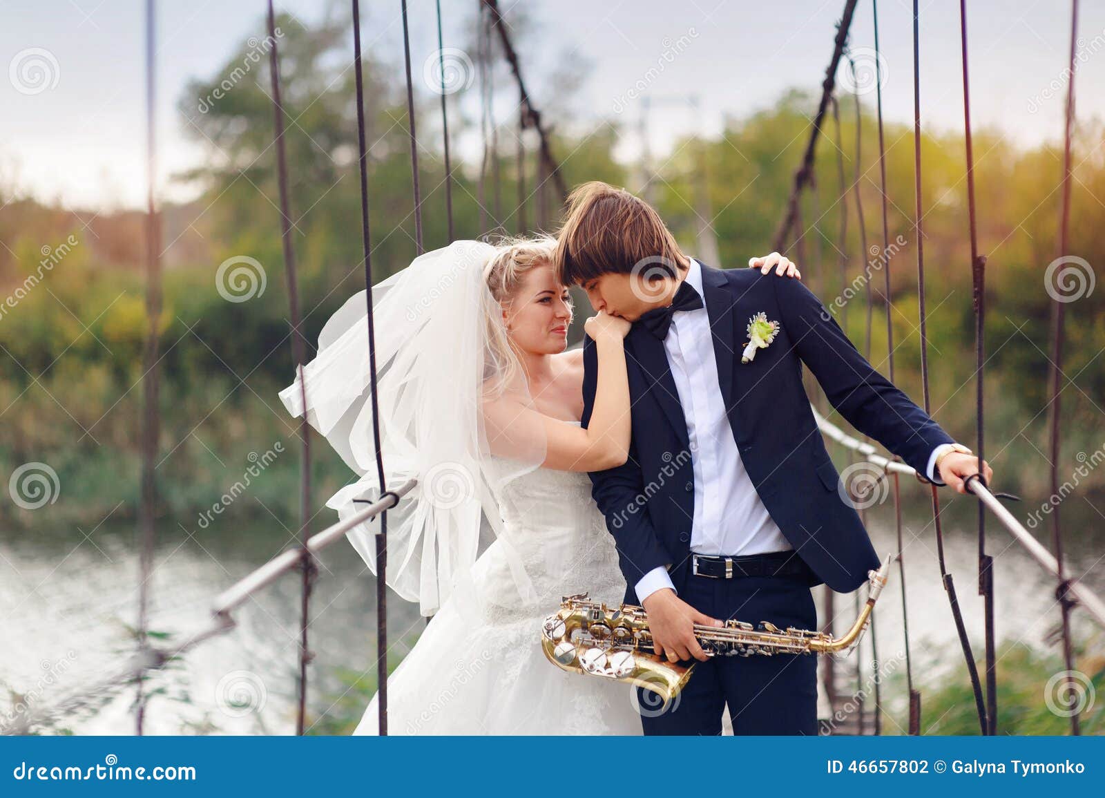 Groom and Bride with Sax Bridge Stock Photo - Image of bride, female ...