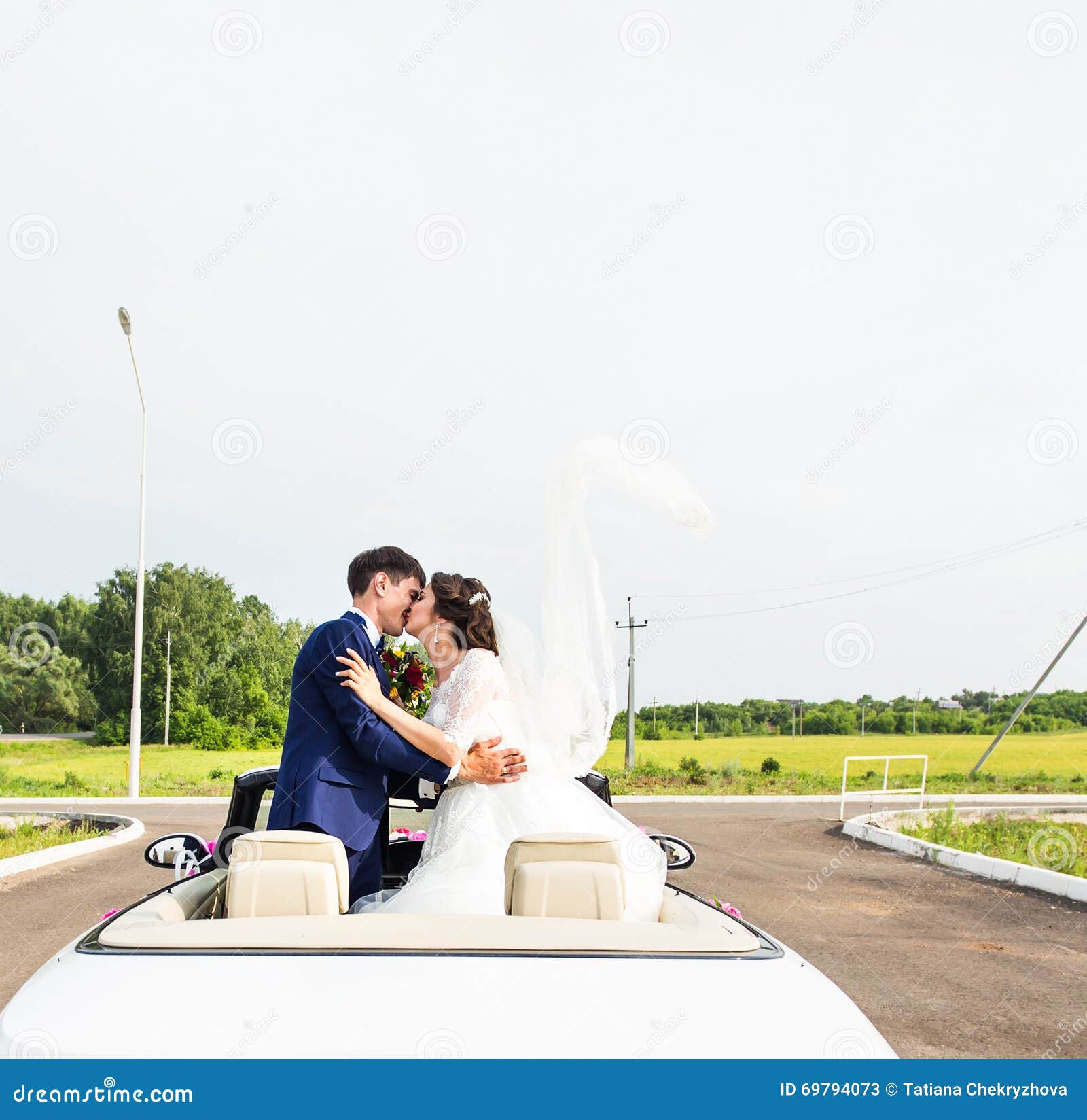 The Groom and the Bride in a White Convertible Car Stock Image - Image ...