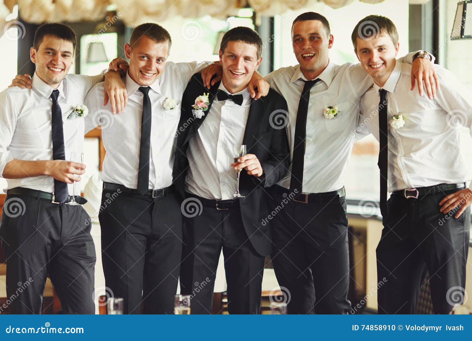 Groom and His Friends Pose in a Restaurant Stock Photo - Image of ...