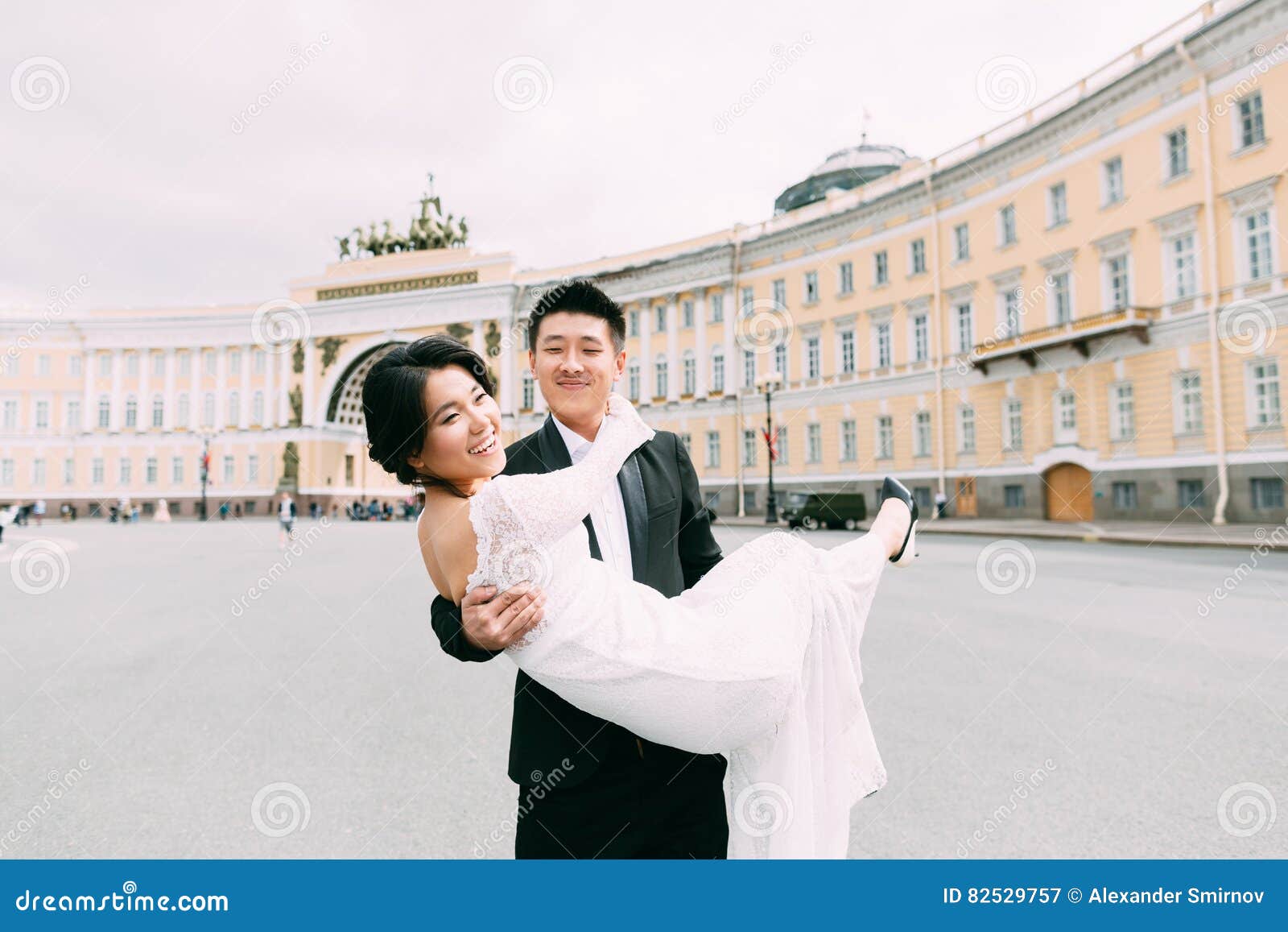 Groom holding bride stock image. Image of closeness, closeup - 82529757