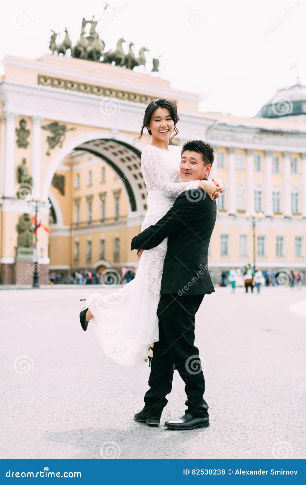 Groom holding bride stock photo. Image of light, closeness - 82530238