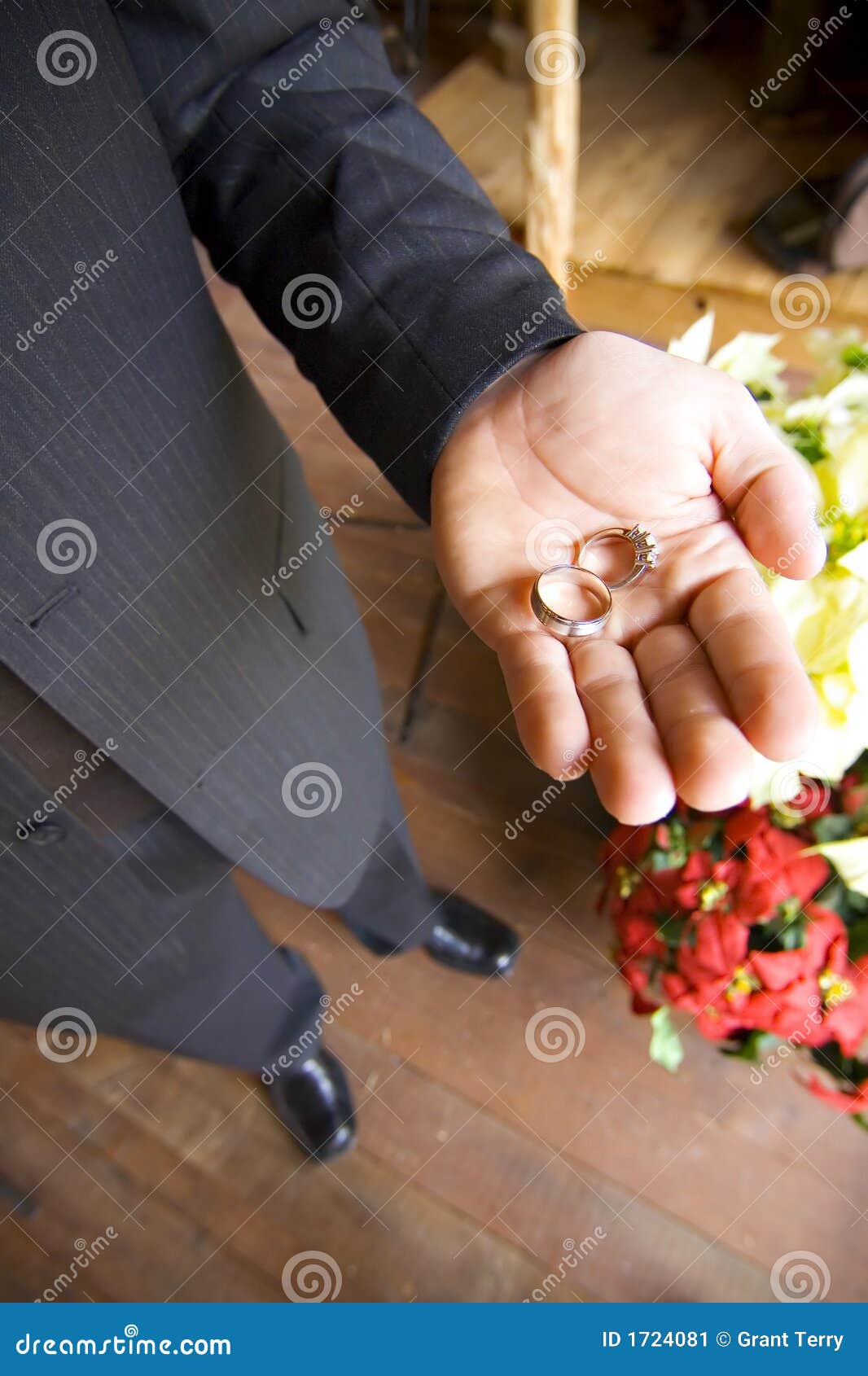 Groom Holding Wedding Rings Stock Image - Image of coupling, commitment ...