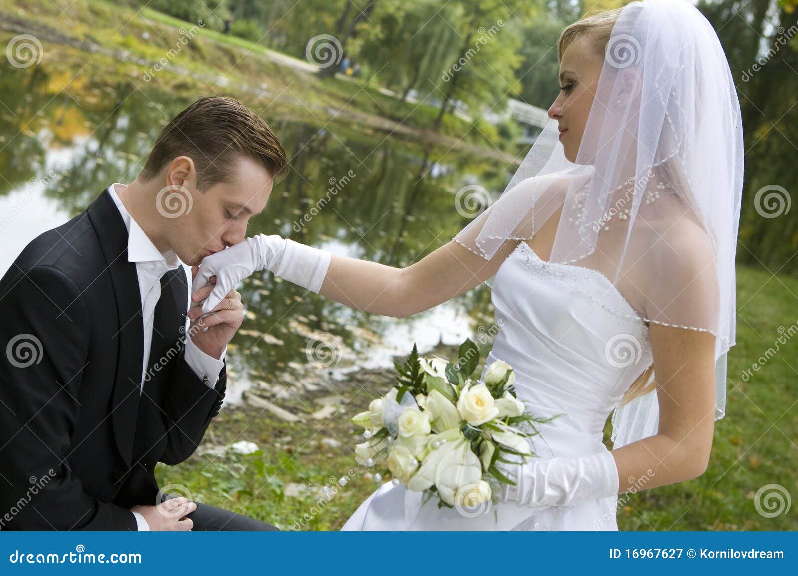 Groom kissing bride s hand stock image. Image of lady - 16967627