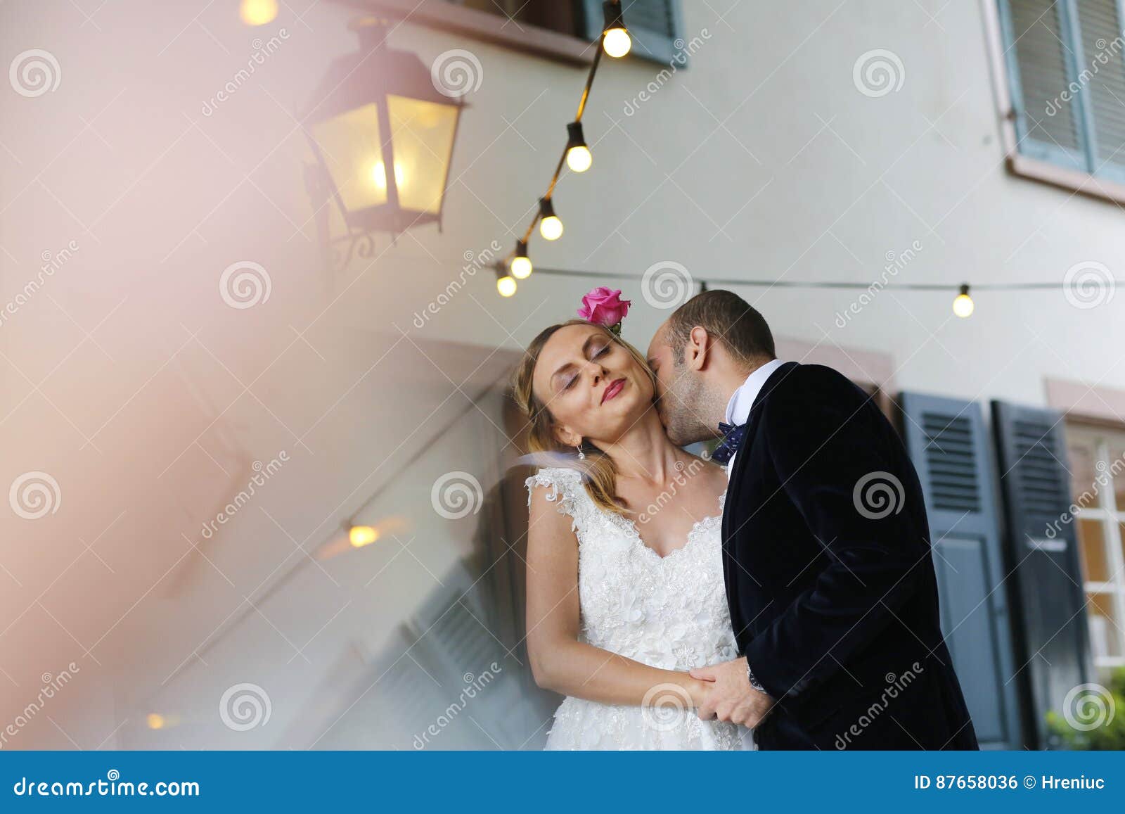 Groom kissing his bride stock photo. Image of groom, wedding - 87658036