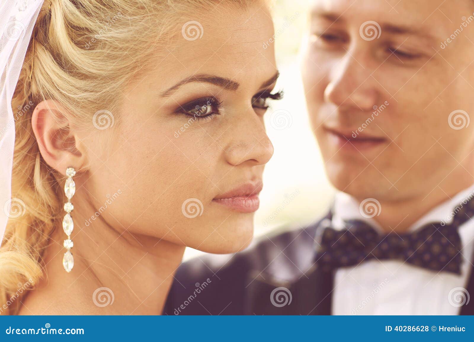 Groom looking at his bride stock photo. Image of together - 40286628